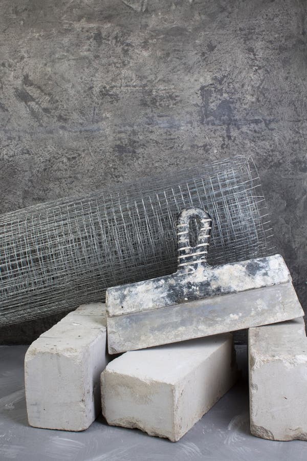 Roll Mesh for Plastering, Putty Knife Bricks, Hammer on the Gray ...