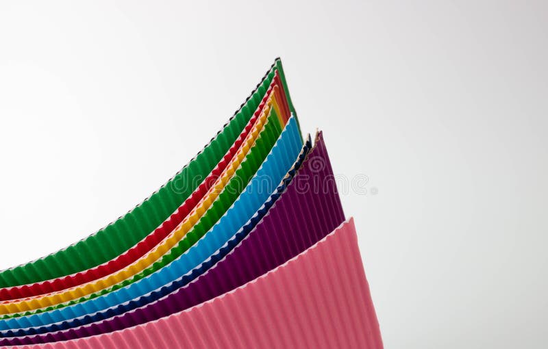 A Roll of Multicolored Sheets of Corrugated Paper Stock Photo - Image ...