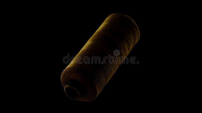 Gold Colored Sewing Thread on a Black Background Stock Video - Video of ...