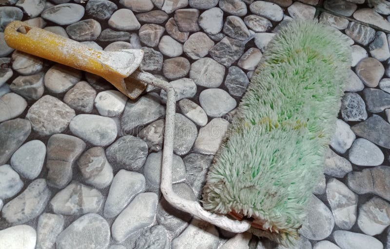 Roll Paint on the Floor with Gravel Texture Stock Photo - Image of ...