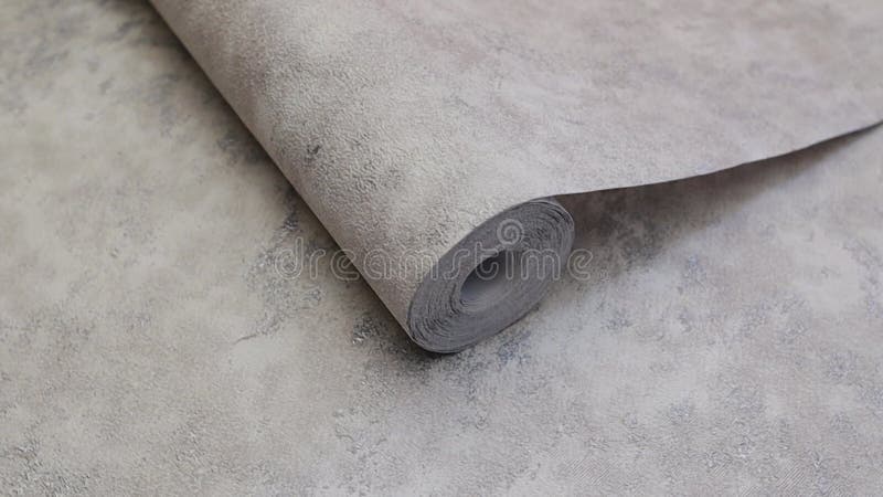 Roll of Paper Wallpaper on the Wall with Texture, Camera Movement ...