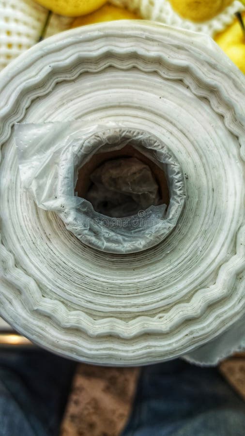 A Roll of Plastic Packaging Material, Showcasing Its Textured Layers ...