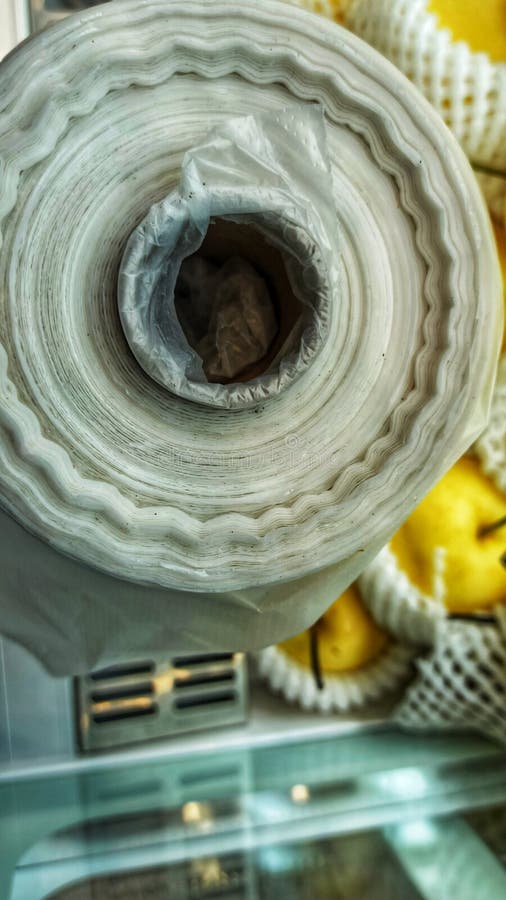 A Roll of Plastic Packaging Material, Showcasing Its Textured Layers ...