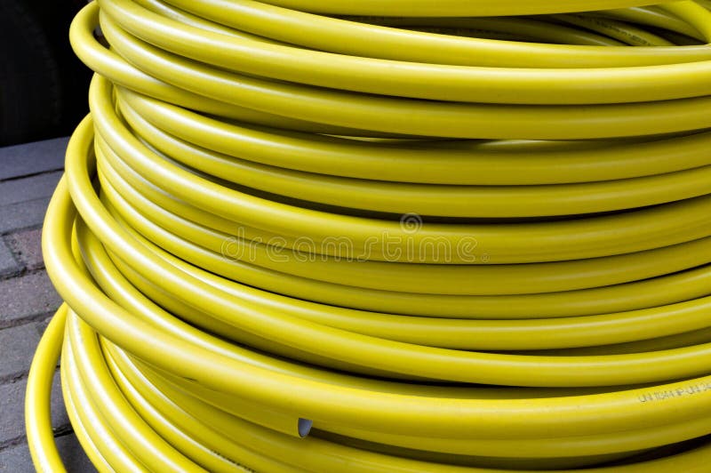 Roll of Plastic Yellow Cable, Texture Stock Photo - Image of pipe ...