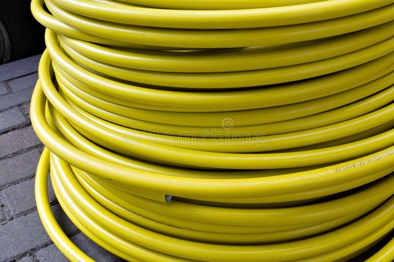 Roll of Plastic Yellow Cable, Texture Stock Photo - Image of hosepipe ...
