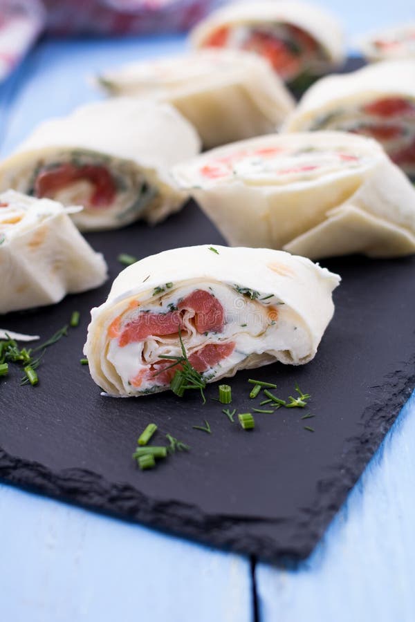 Roll from Red Fish with Cheese and Greens Stock Photo - Image of wooden ...