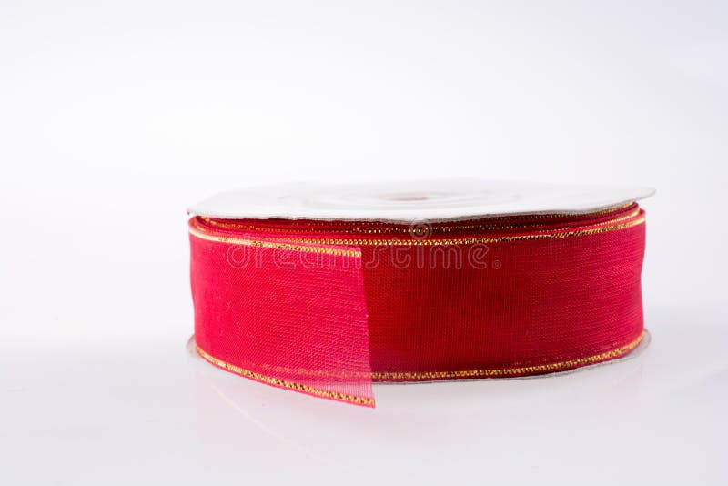 A roll of red ribbon stock image. Image of unrolling - 128347697