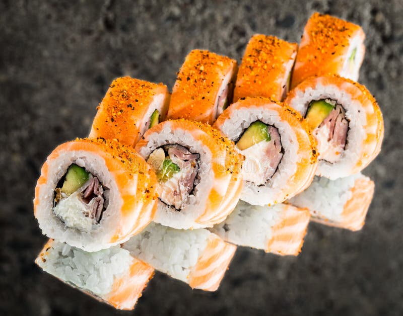 Roll with Salmon, Bacon and Avocado Stock Photo - Image of grunge ...