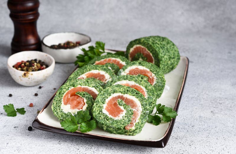 Roll with Spinach and Salmon. Snack with Red Fish and Cheese and Lemon ...