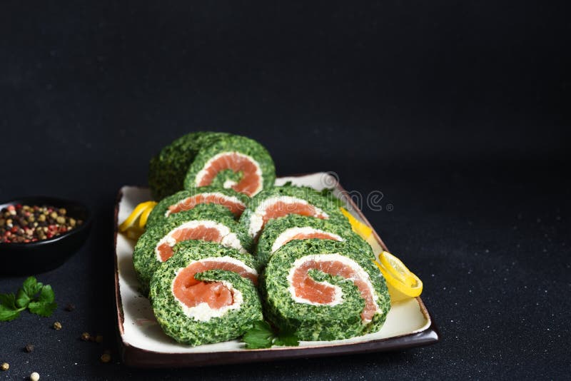 Roll with Spinach and Salmon. Snack with Red Fish and Cheese and Lemon ...