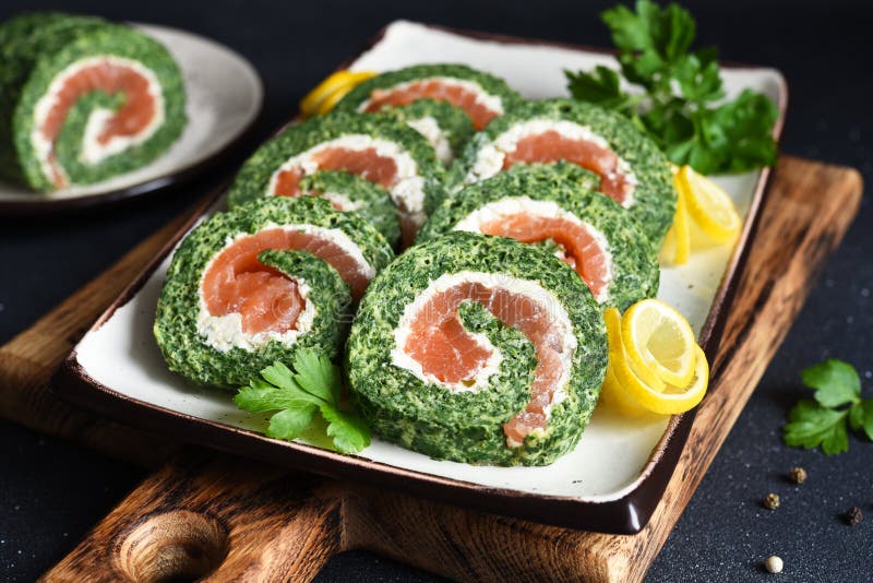 Roll with Spinach and Salmon. Snack with Red Fish and Cheese and Lemon ...