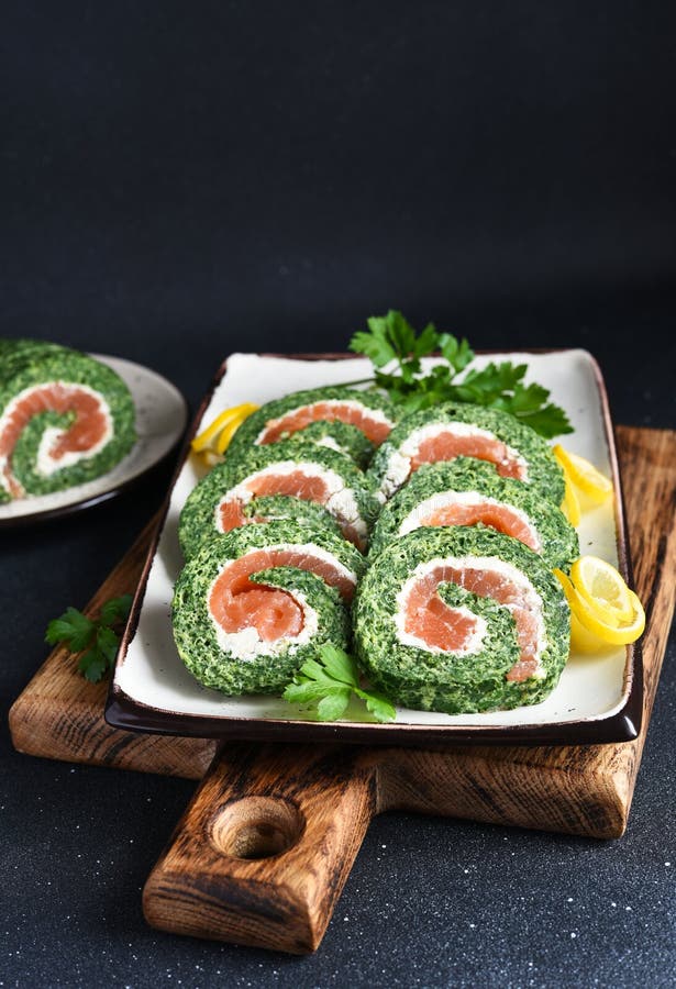 Roll with Spinach and Salmon. Snack with Red Fish and Cheese and Lemon ...