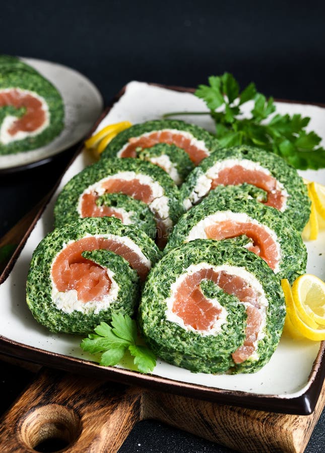 Roll with Spinach and Salmon. Snack with Red Fish and Cheese and Lemon ...