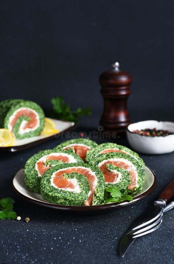 Roll with Spinach and Salmon. Snack with Red Fish and Cheese and Lemon ...