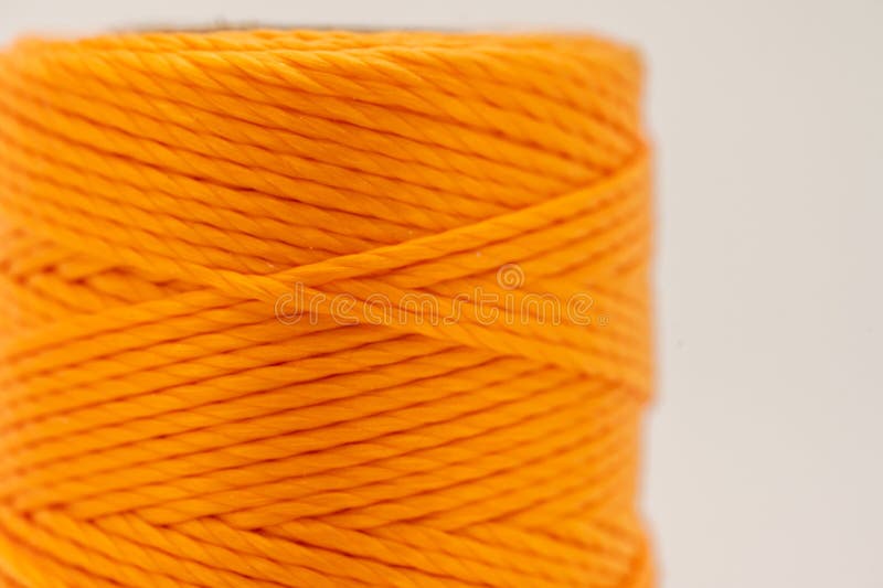 A Roll of Synthetic Orange Thread.. Stock Photo - Image of equipment ...