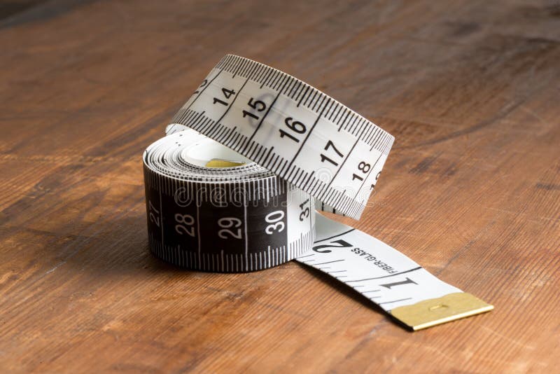 Roll of Tape Measure on a White Background Stock Photo - Image of tape ...