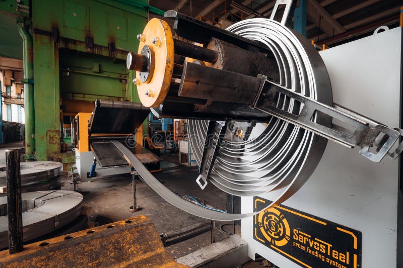 Metal Coil Uncoiling for Industrial Manufacturing in a Factory Ready ...