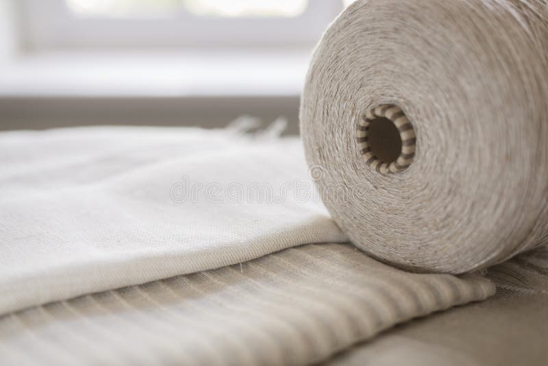 Roll of Thread Next To Window with Leaves Stock Photo - Image of cord ...
