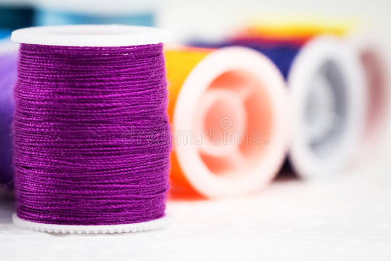 The Roll of Thread Put at the Left Side on Background,purple Color ...