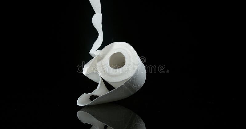 Roll of Toilet Paper Falling on Black Background Stock Photo - Image of ...