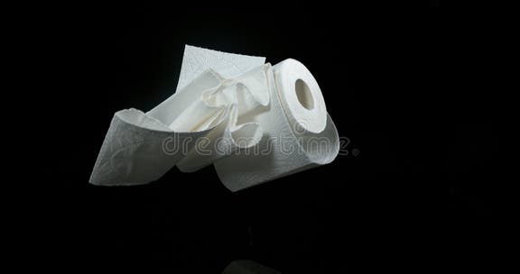 Roll of Toilet Paper Falling on Black Background Stock Image - Image of ...