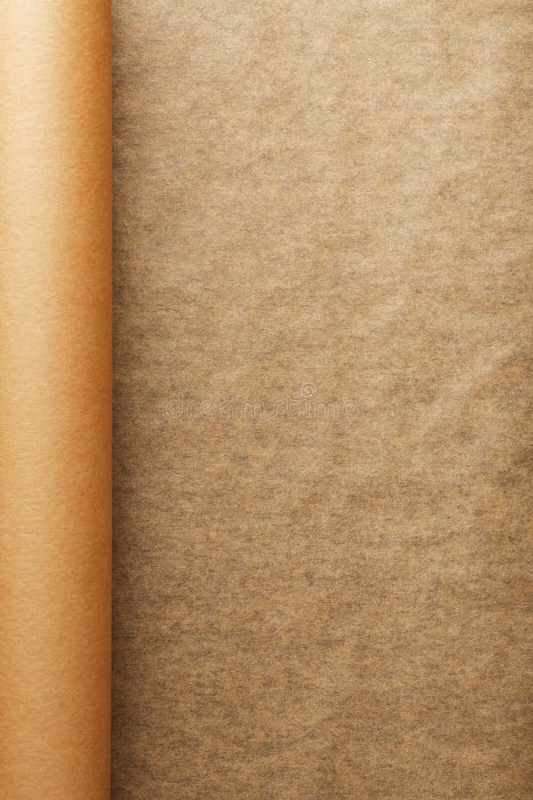 A Roll of Unfolded Brown Parchment Paper, for Baking Food in on a Dark ...