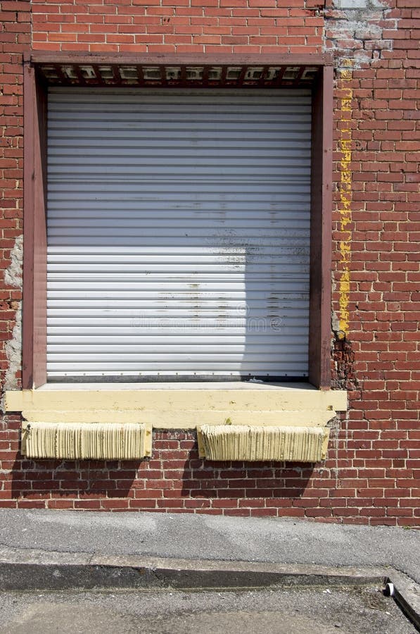 Roll Up Door at an Old Loading Dock at an Empty Factory Stock Photo ...