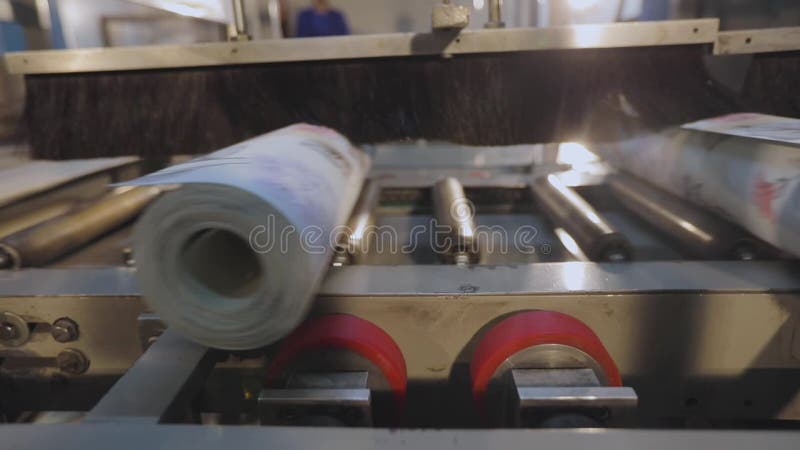 A Roll of Wallpaper on a Conveyor Line. Roll of Wallpaper. Conveyor ...