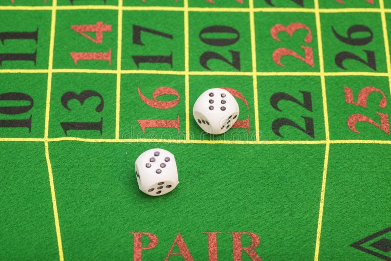Roll of the White Dice on a Game Table in a Casino Stock Photo - Image ...