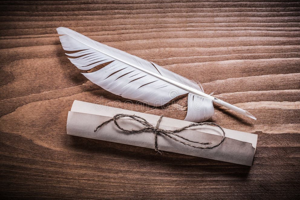 Rolled Aged Paper Quill on Wooden Board Horizontal Stock Image - Image ...
