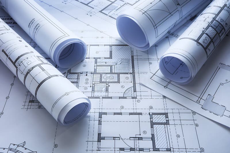 Rolled Architectural Blueprints Showcasing Floor Plans and Detailed ...