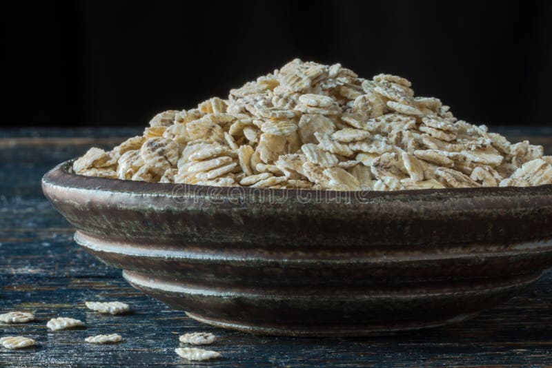 Rolled Barley Flakes in a Bowl Stock Photo - Image of macro, barley ...