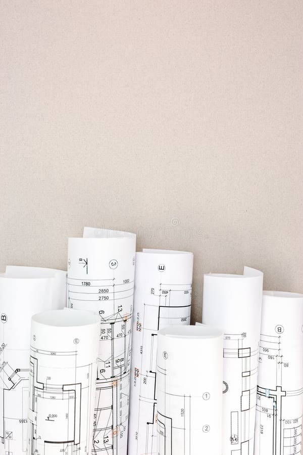 Rolled Blueprints on Desk with Copy Space Stock Photo - Image of paper ...