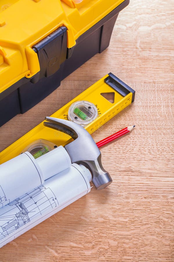 Rolled Blueprints Hammer Level Tool Box on Wooden Stock Photo - Image ...