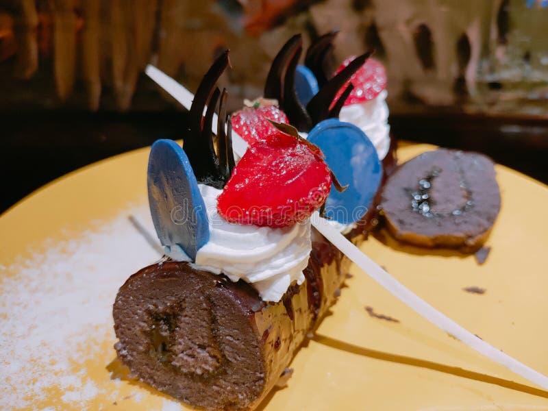 The Rolled Chocolate Sponge Cake. Stock Photo - Image of closeup, brown ...