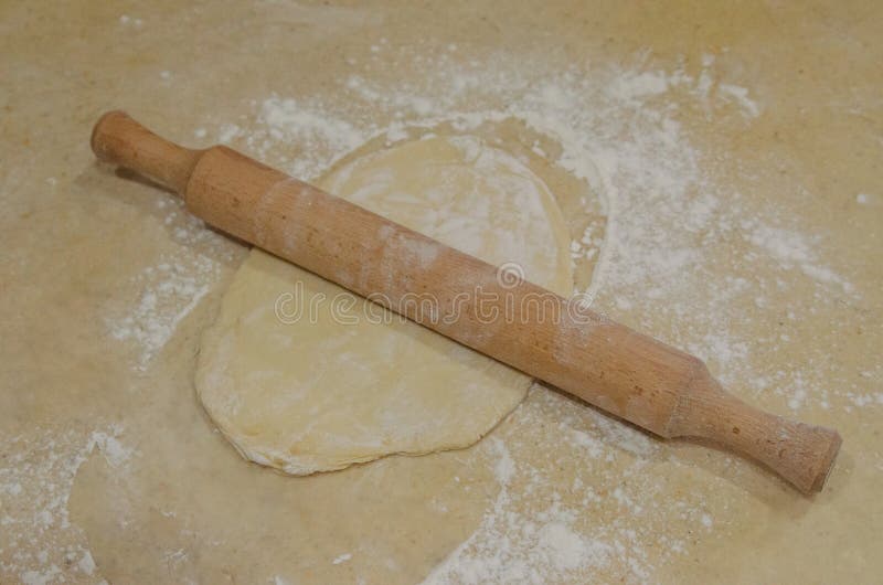 Rolled dough on the table stock photo. Image of round - 164529798