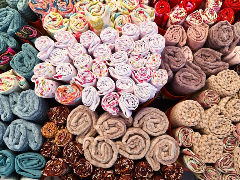 Rolled Fabric Textiles Displaying Colorful Patterns and Textures Stock ...