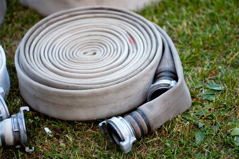 Rolled Up Red Fire Hose Extension Soft Pipe on White Stock Image ...