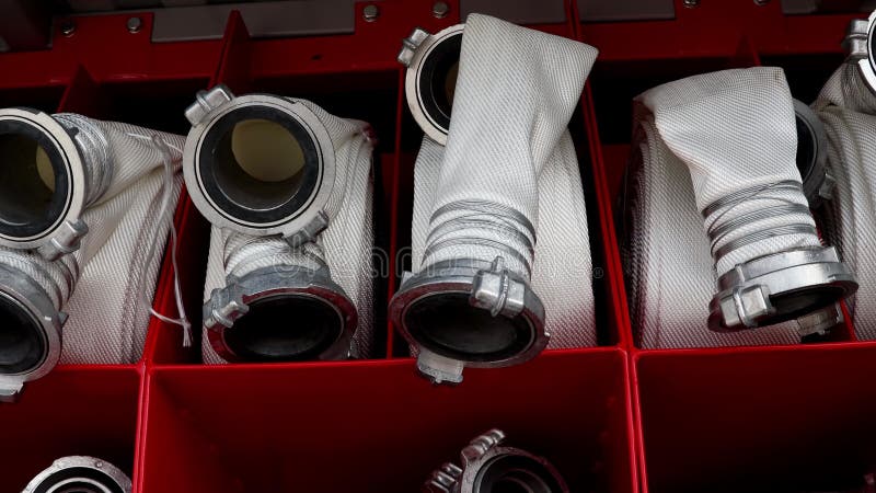 Rolled Fire Hoses, Arranged in Rows, in the Glove Compartment of the ...