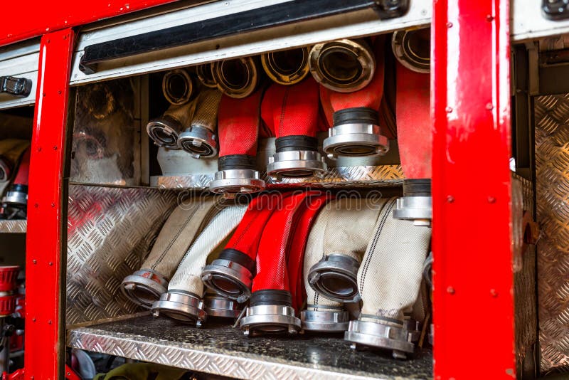Rolled Fire Hoses, Arranged in Rows, in the Glove Compartment of the ...