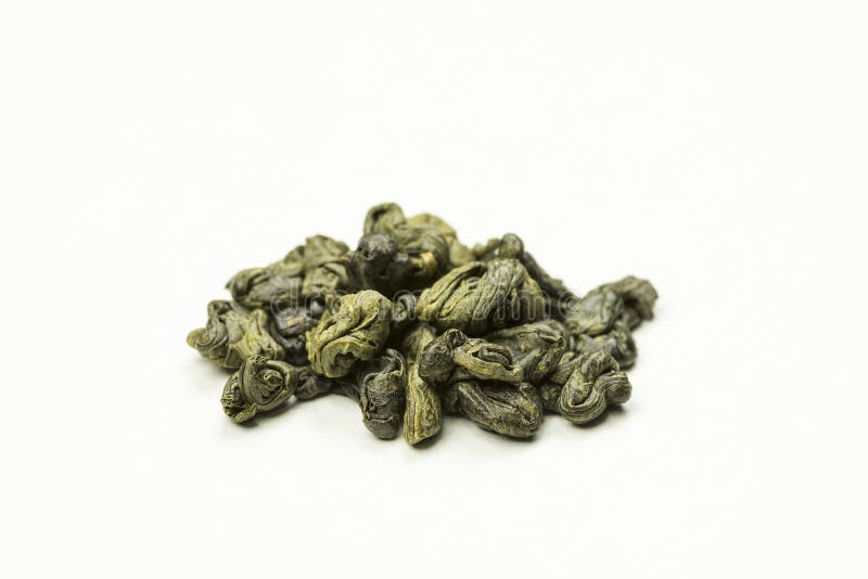 Rolled Green Tea Leaves on a White Background Stock Photo - Image of ...