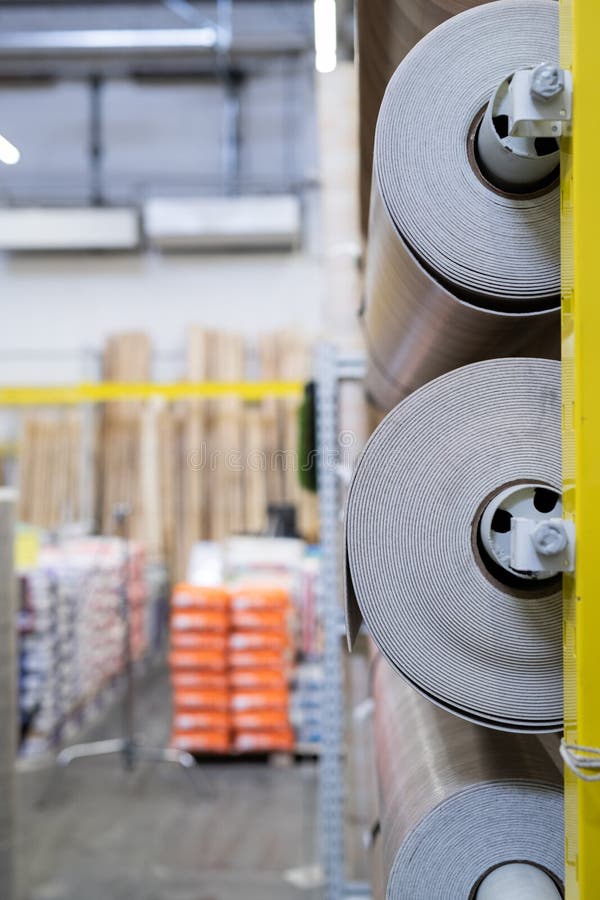 Rolled Linoleum on Display Inside Huge Warehouse Stock Image - Image of ...