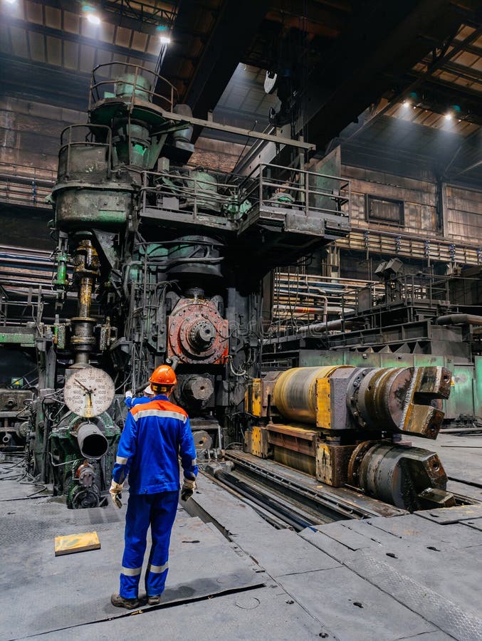 Rolled Metal Factory. Continuous Hot Rolling Mill and Factory Worker ...