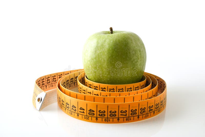 Rolled Meter in a Circle and Apple Inside White Background Stock Image ...