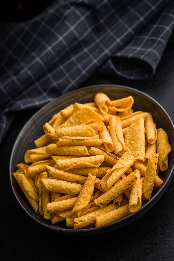 Rolled Nachos Tortilla Chips on Plate on Black Table Stock Photo ...