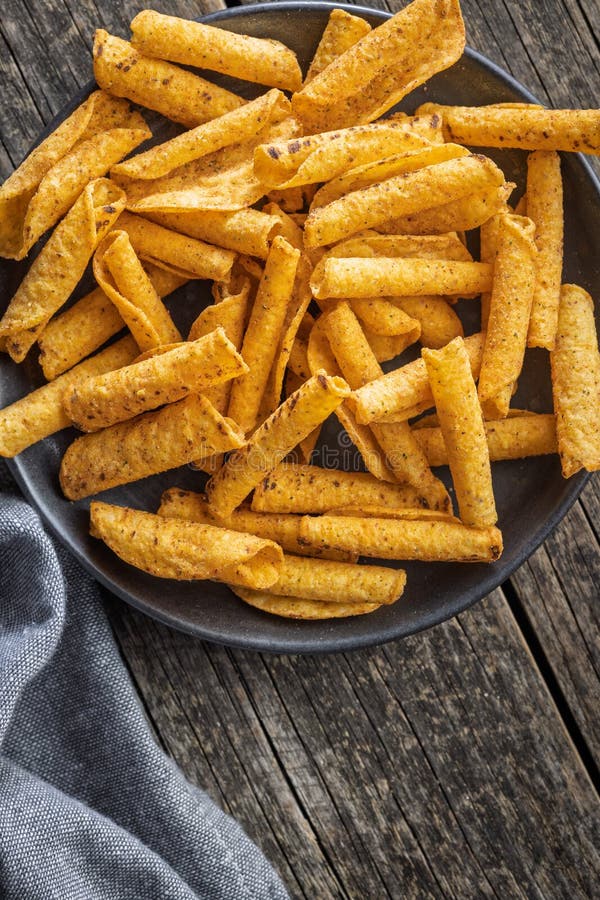 Rolled Nachos Tortilla Chips on Plate on Wooden Table. Top View Stock ...