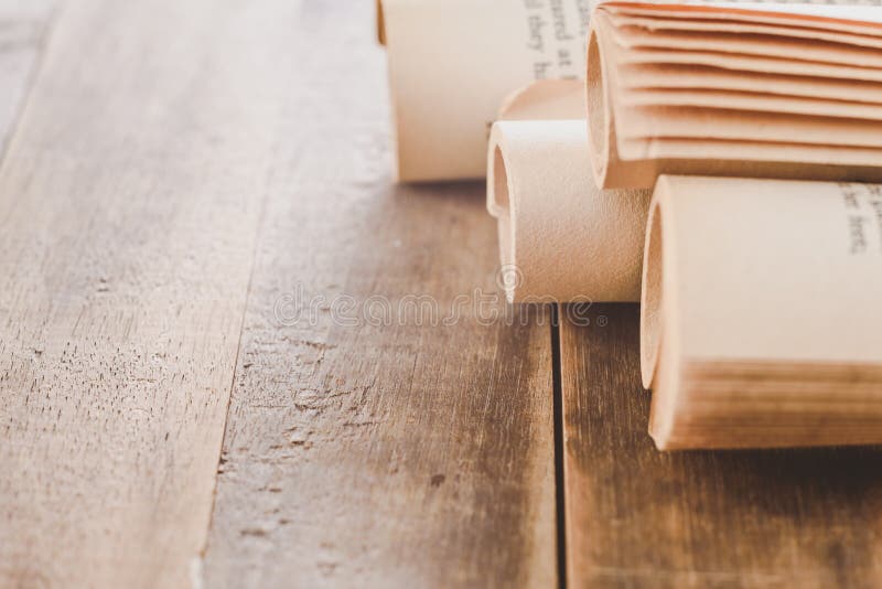 Rolled old book page stock image. Image of library, paper - 144168139