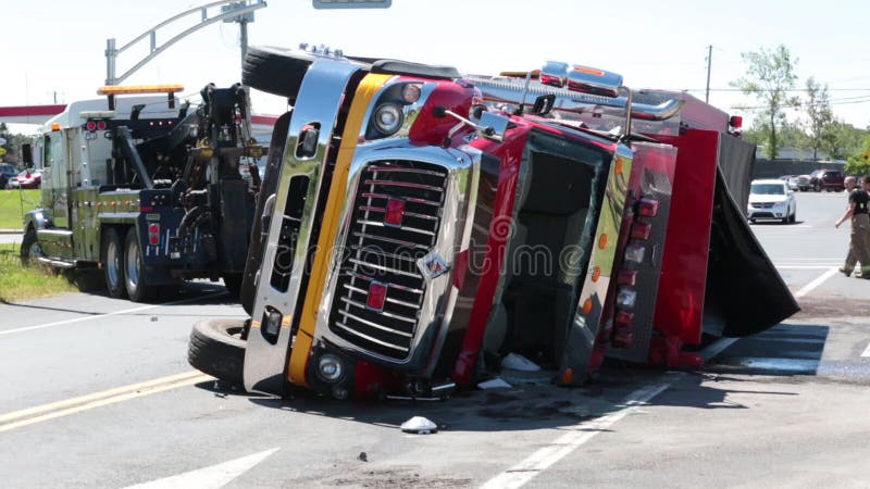 Rolled Over Firetruck. Heavy Tow Trucks Try To Bring Back Up. Stock ...
