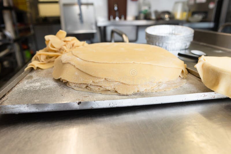Rolled Pastry Closeup Kitchen on the Background with Tools and Pastry ...