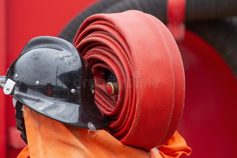 Rolled into a Roll Red Fire Hose, Fire Equipment Extinguishers R Stock ...